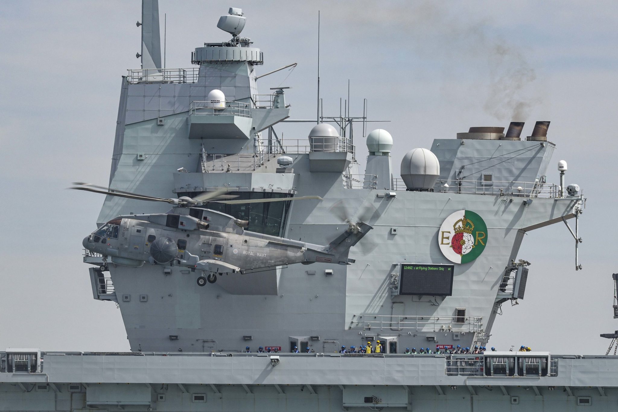 British Navy Crowsnest-equipped Merlins deploy on first carrier voyage